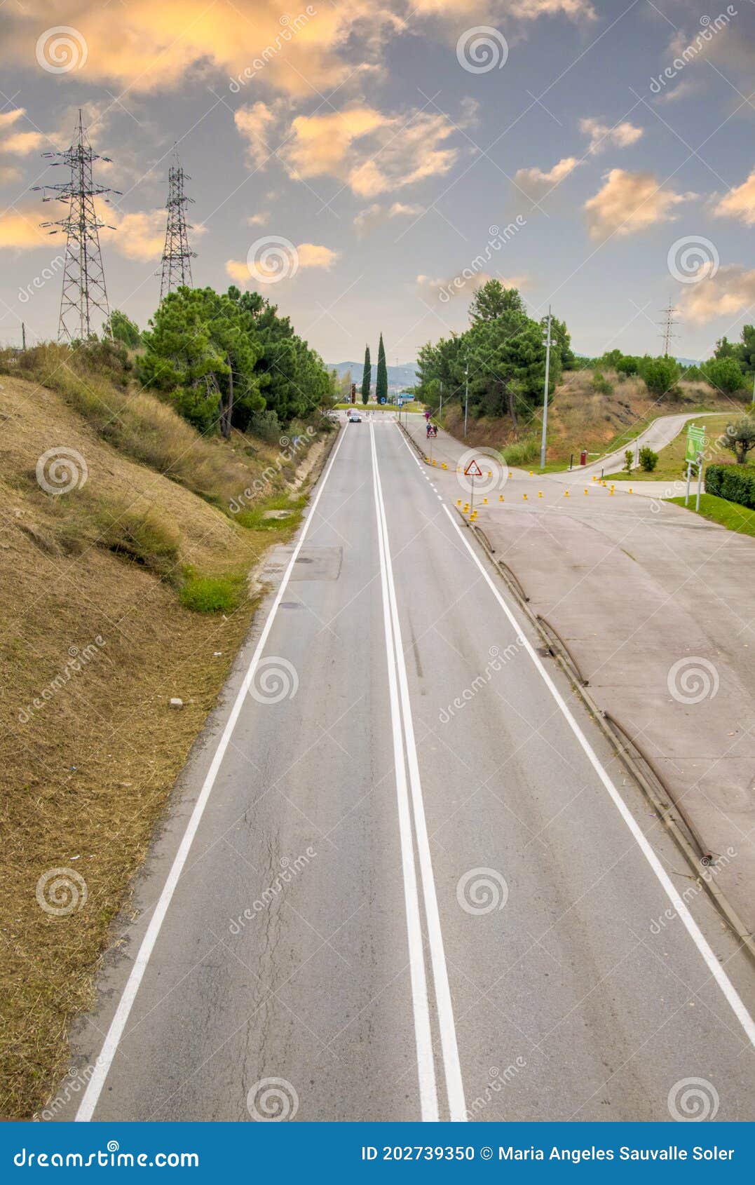 Straight road at sunset. stock photo. Image of road - 202739350