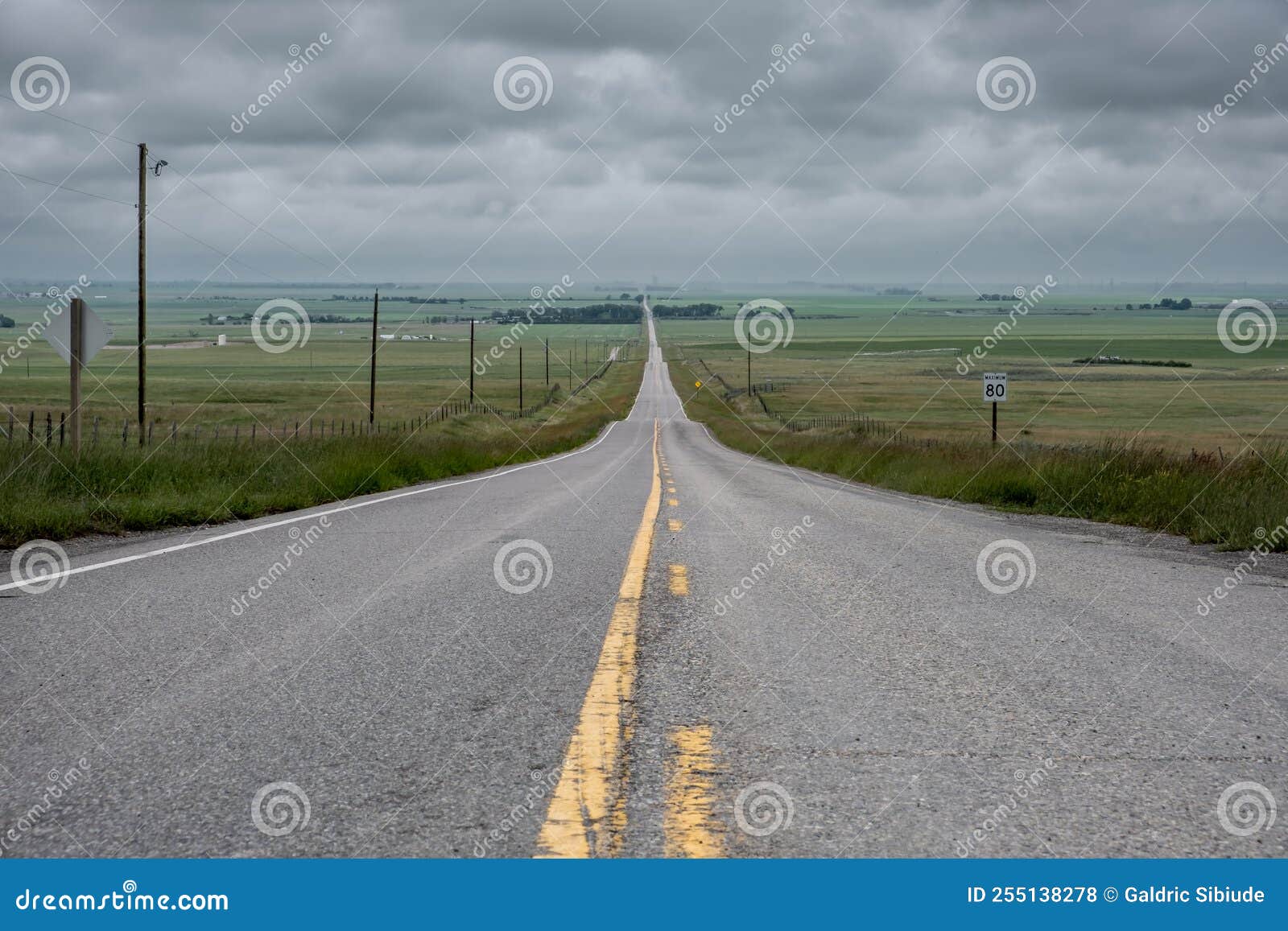 Straight Road in the Vast Plains of Alberta Stock Photo - Image of ...