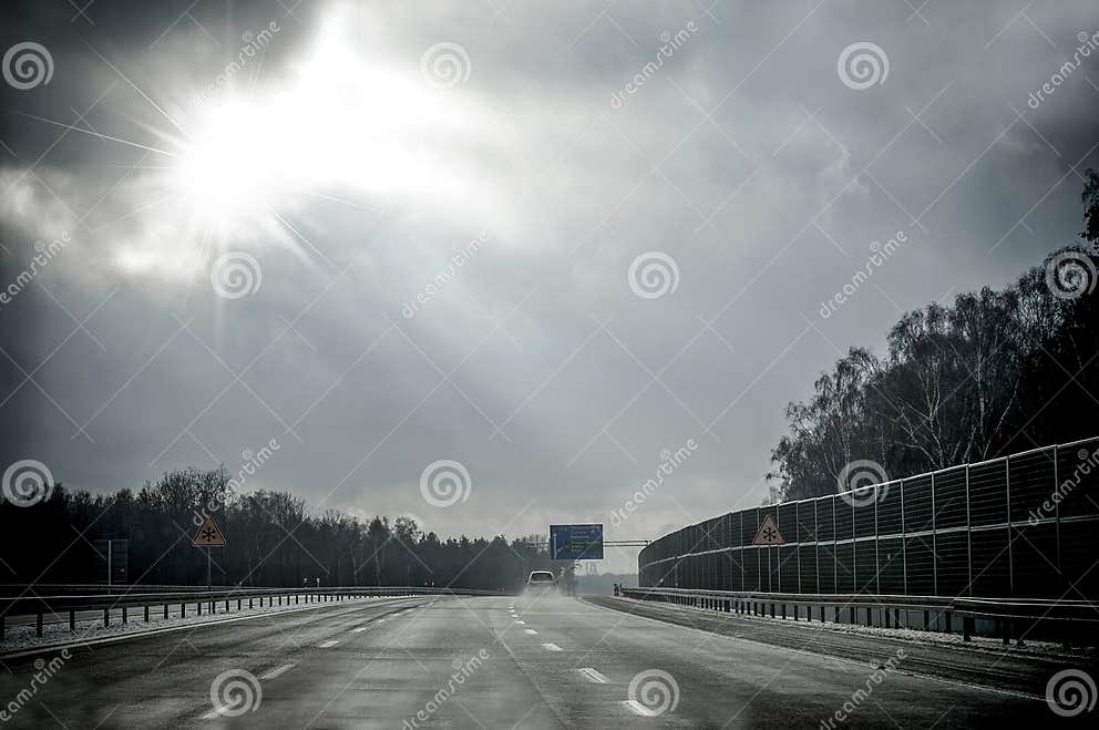 Straight Tar Road Leading into the Light Stock Image - Image of line ...
