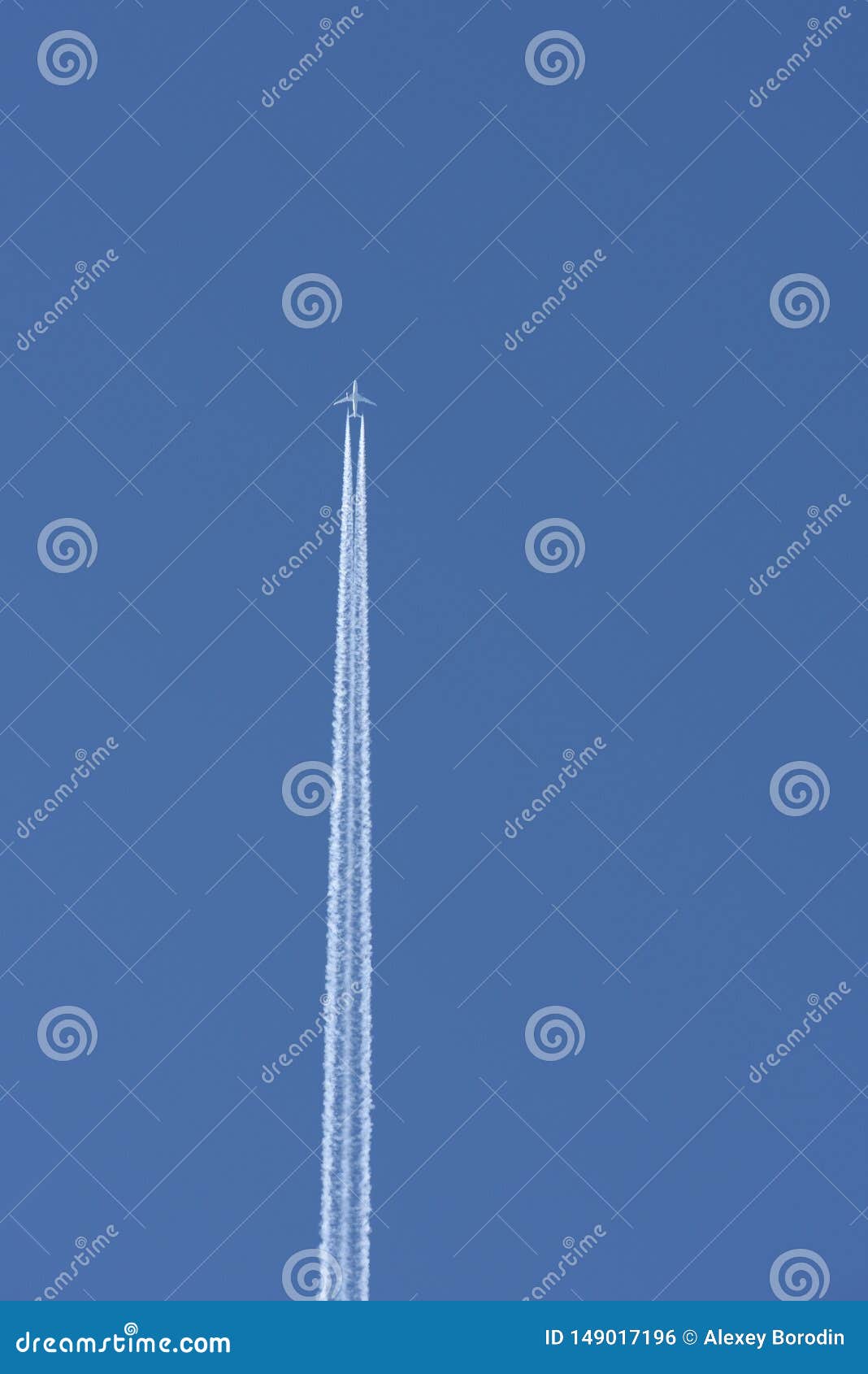 Straight Vertical Airplane Trail in Clear Blue Sky Stock Photo - Image ...
