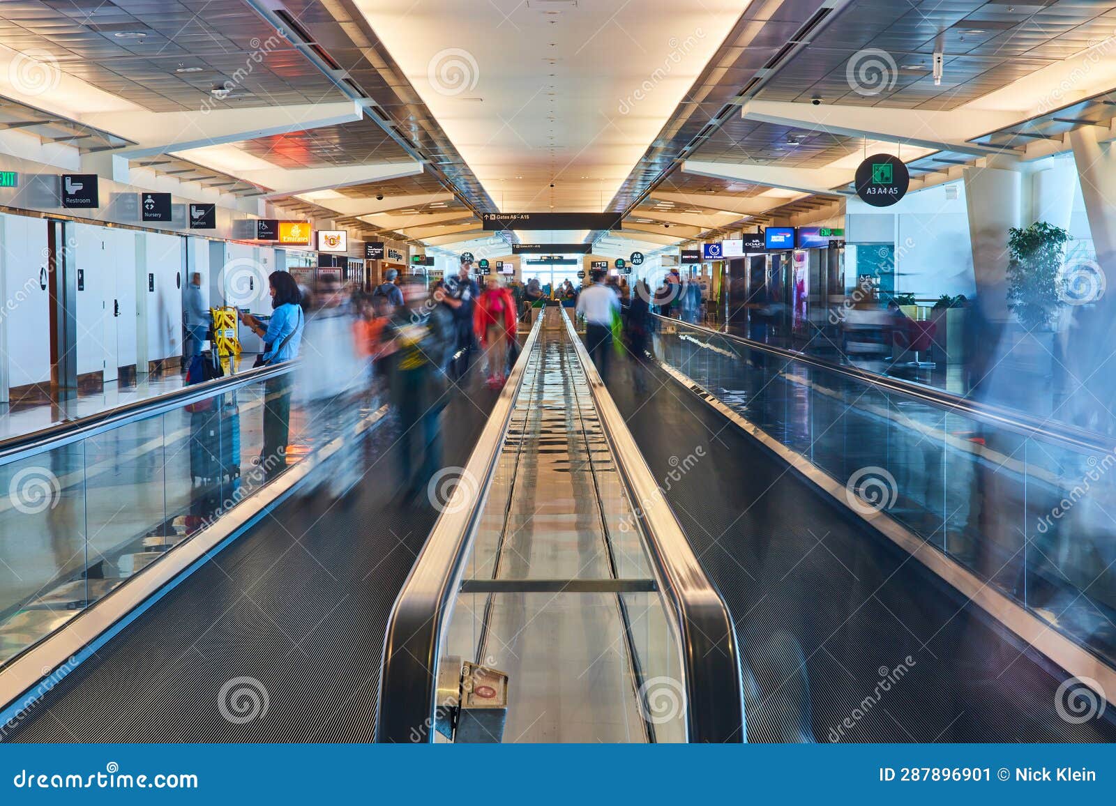 Straight on View of Crowded Walkway with Artistic Blur Showing Movement ...
