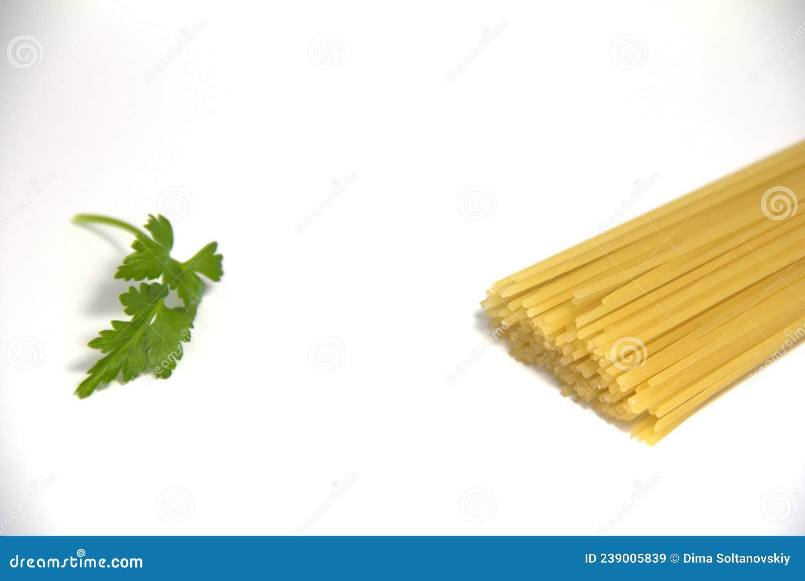 Straight Yellow Spaghetti. on a White Background. and Greens with ...