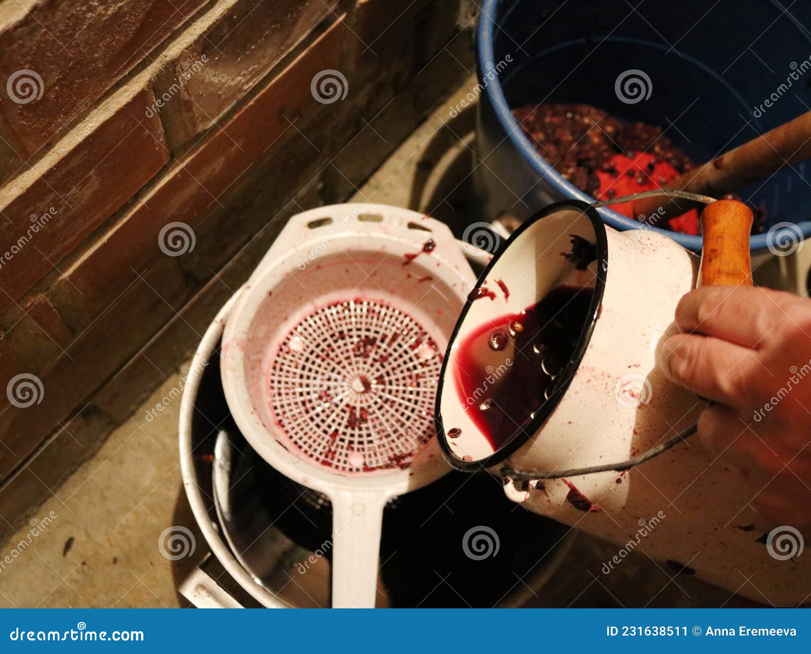 Straining Grape Juice through a Colander Stock Image - Image of bowl ...