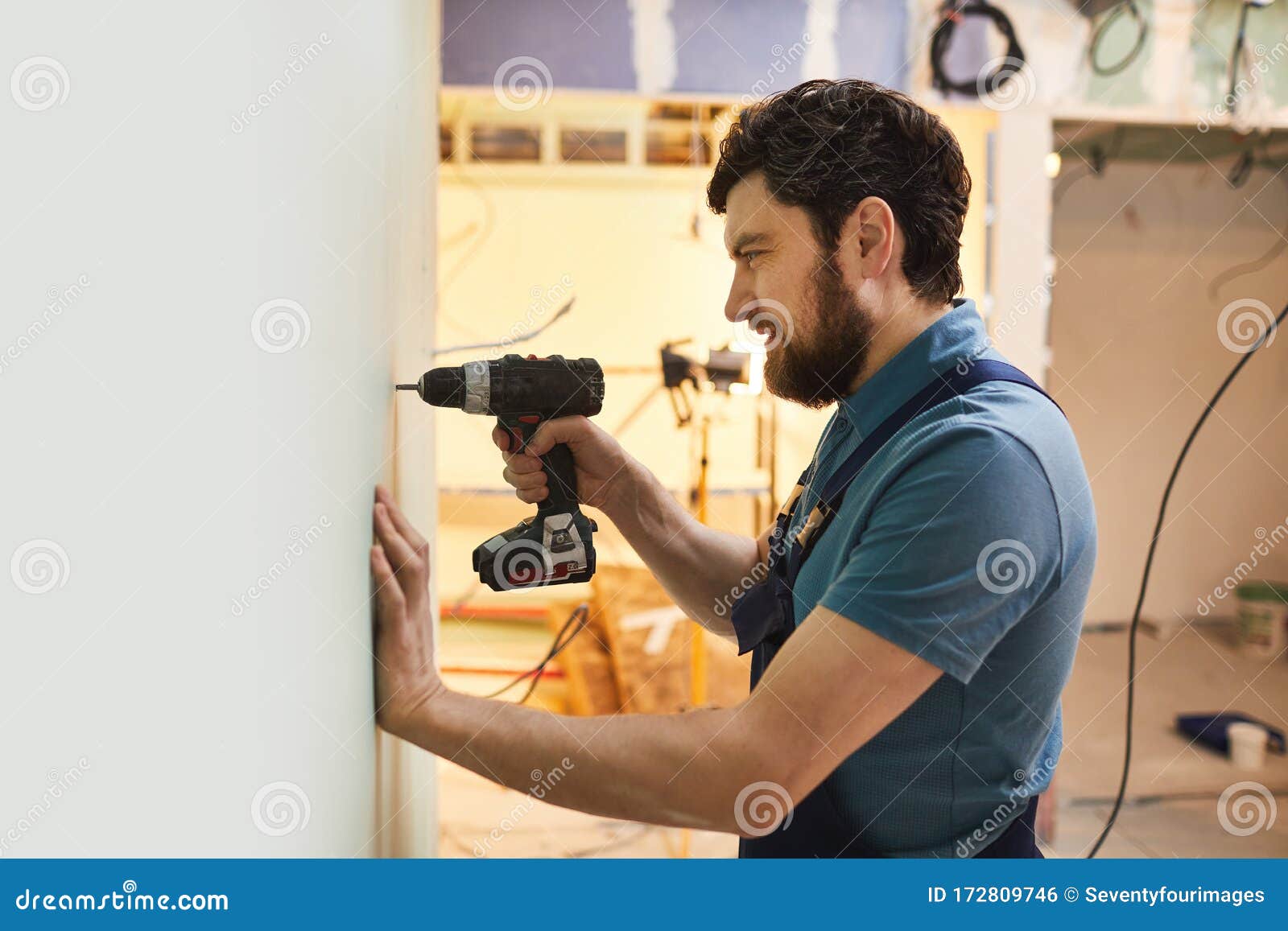 Straining Man Drilling Wall Stock Photo - Image of enovating ...