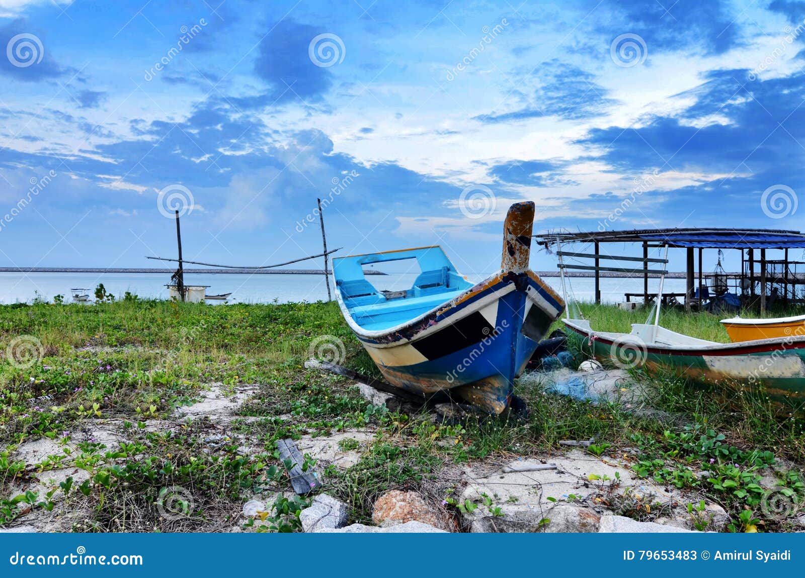 Stranded boat by seashore stock image. Image of ocean - 79653483