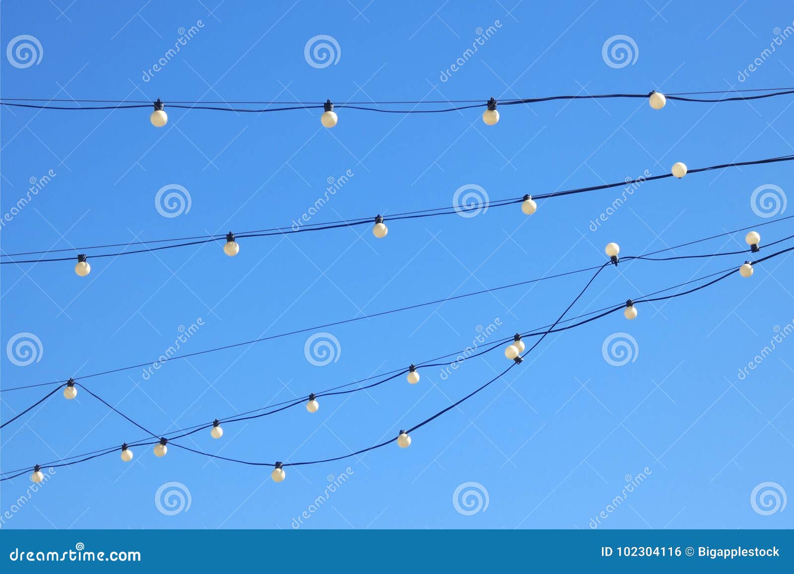 Strands of Lightbulbs stock photo. Image of blue, bulbs - 102304116
