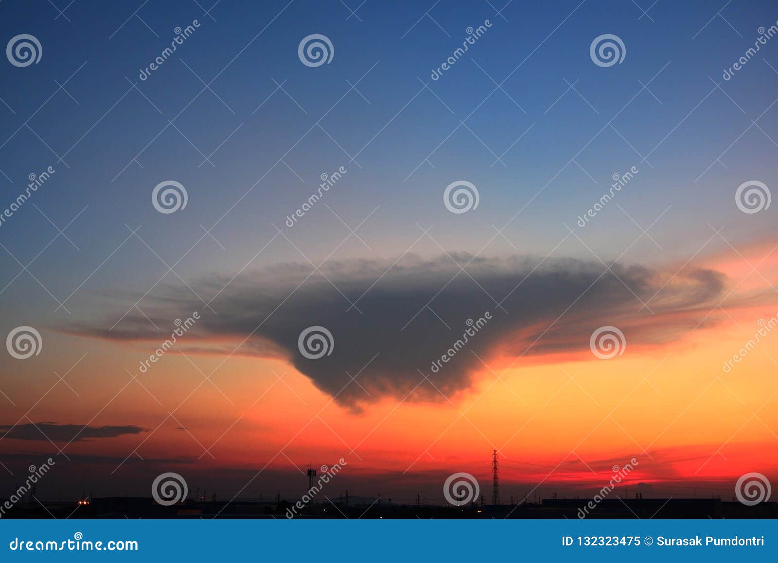 A Strange Cloud Shape on Blue Sky Background with Sunrise Stock Image ...
