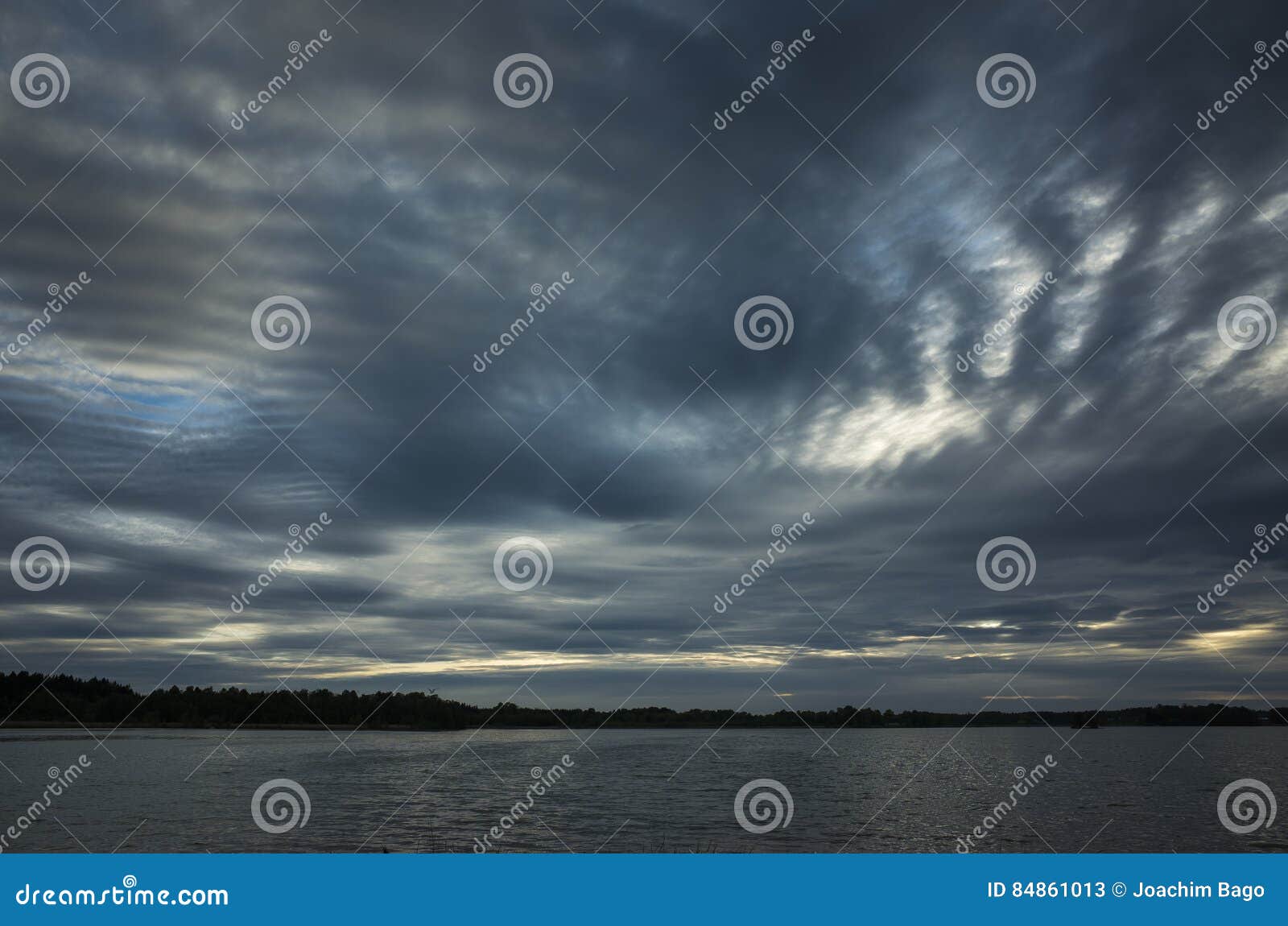 Strange Cloud Pattern in the Sky Over a Lake in Sweden Europe. Stock ...