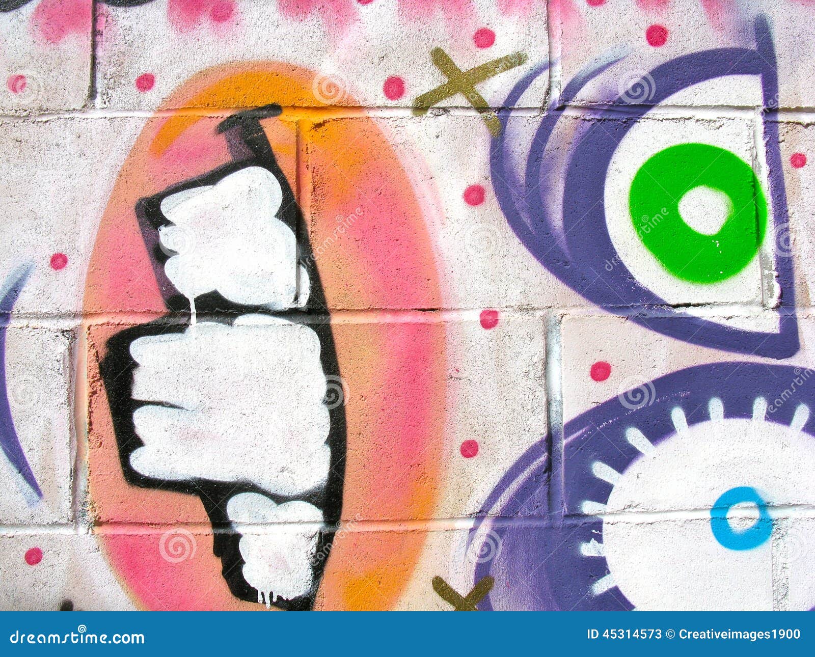 Strange, Painted Face on a Cement Block Background Stock Image - Image ...