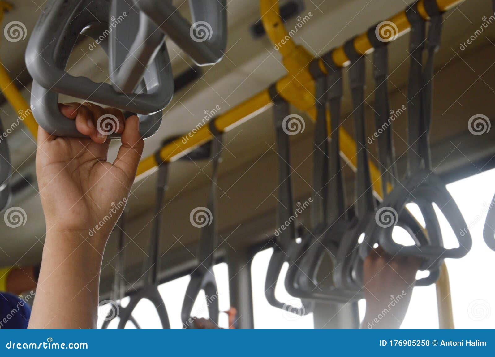 Strap hangers stock photo. Image of group, lifestyle - 176905250
