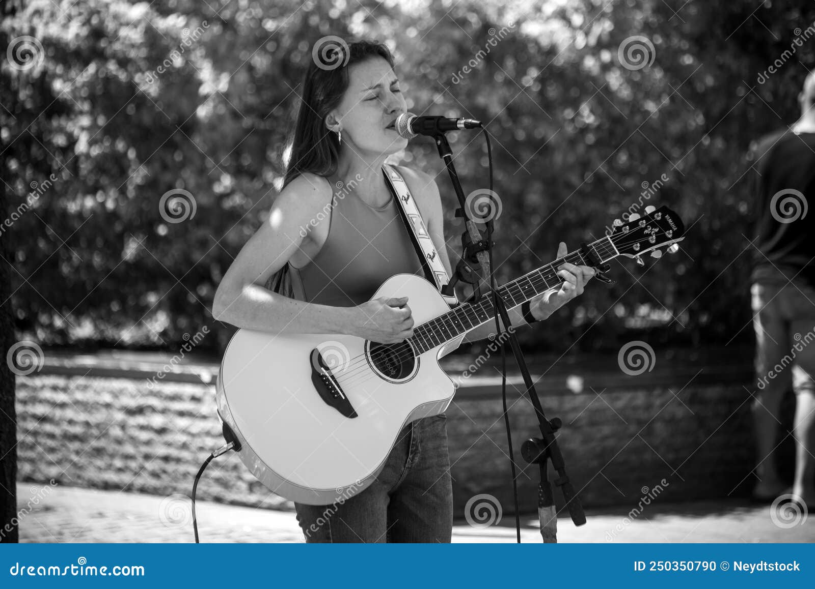 Young Woman Playing Guitar In The Street Editorial Image Image Of