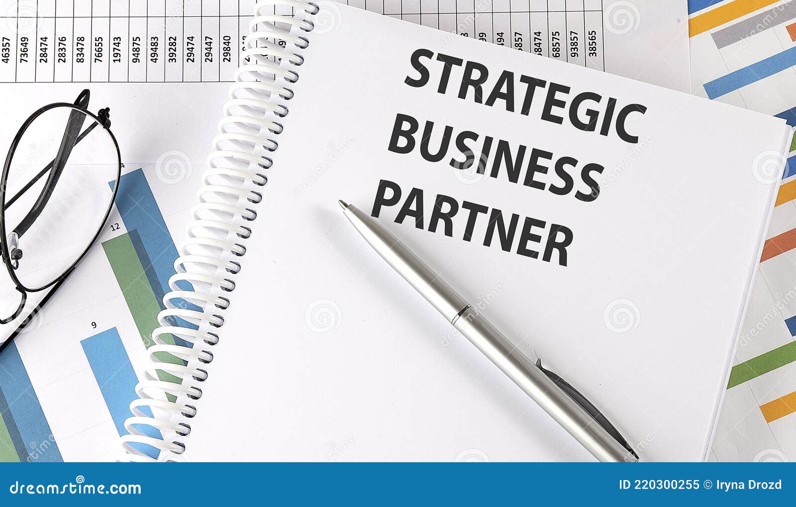 STRATEGIC BUSINESS PARTNER, Pen and Glasses on Chart Stock Image ...
