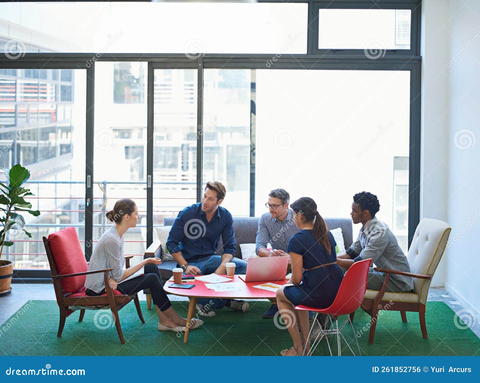 Strategy Sesh. a Group of Office Workers Talking Together in a Meeting ...