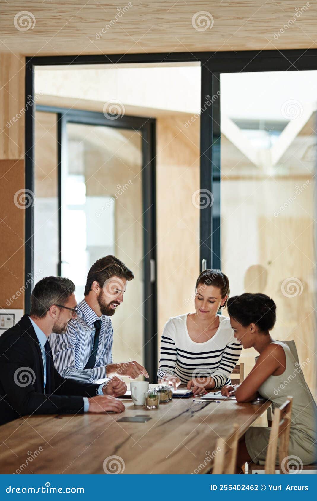 Strategy Session in Progress. a Group of Colleagues Using a Digital ...