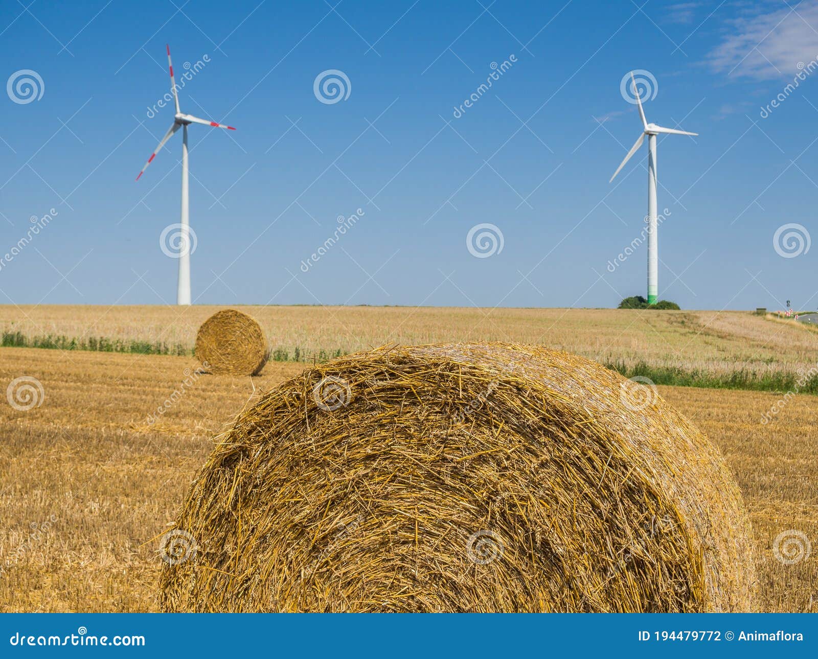Straw Bale with Wind Turbines Stock Photo - Image of landscape, wind ...