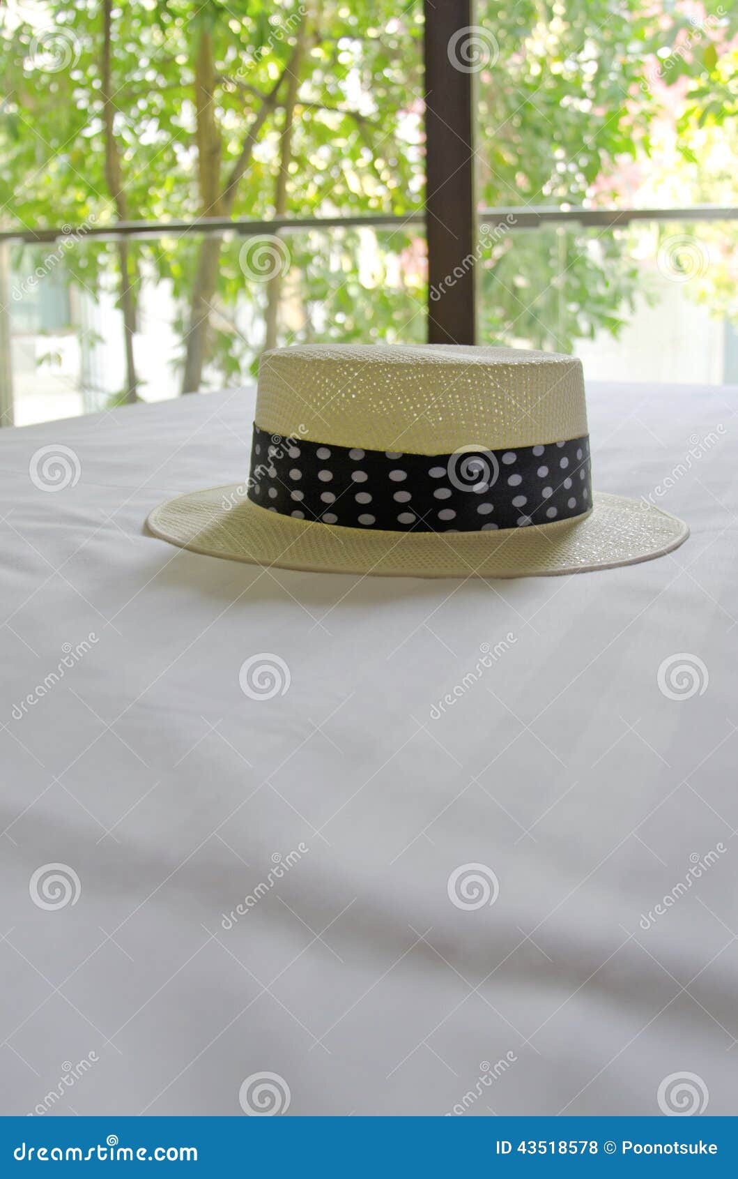 Straw hat on the bed stock photo. Image of straw, indoors - 43518578