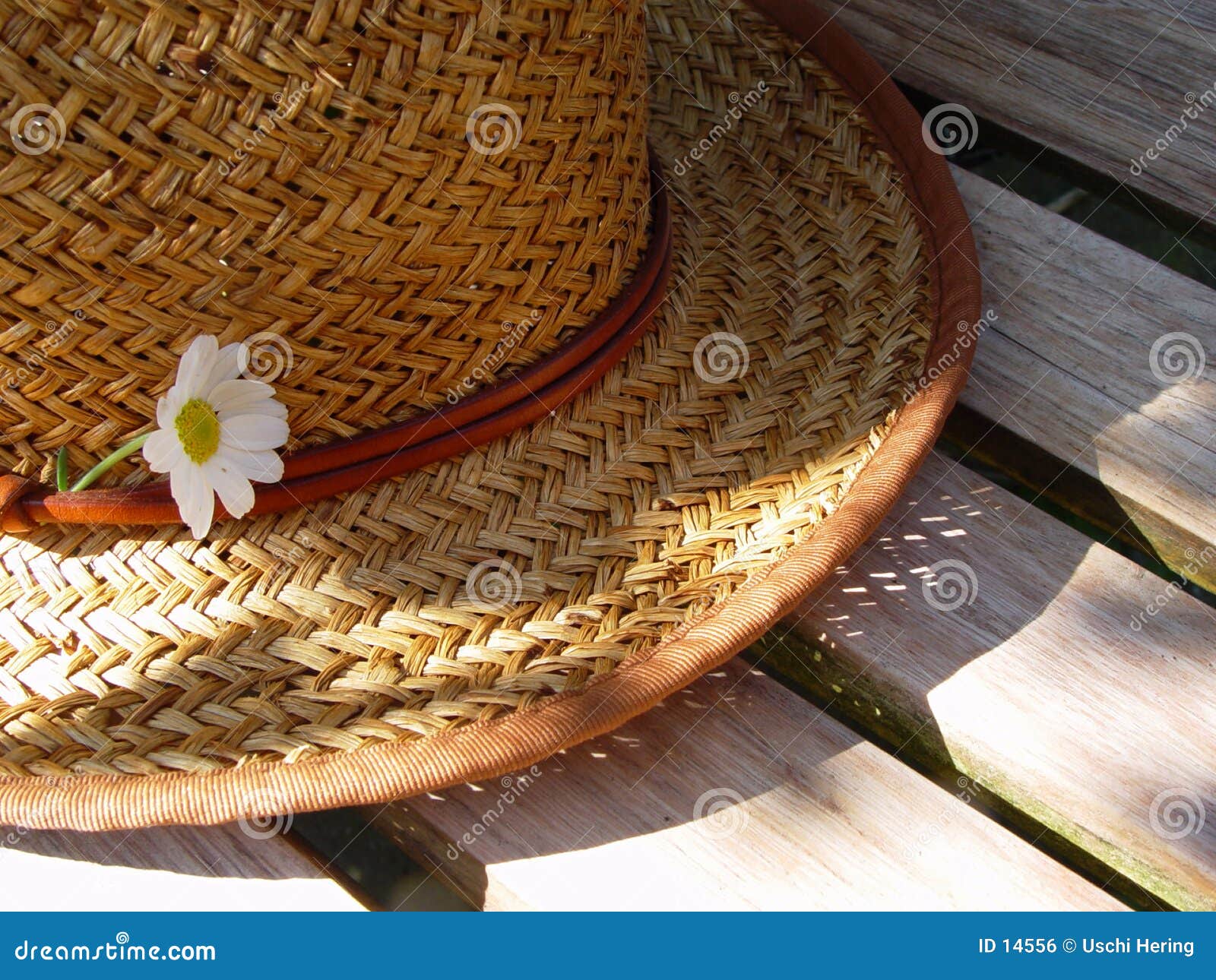 Straw Hat On The Bench Stock Photo | CartoonDealer.com #121752102