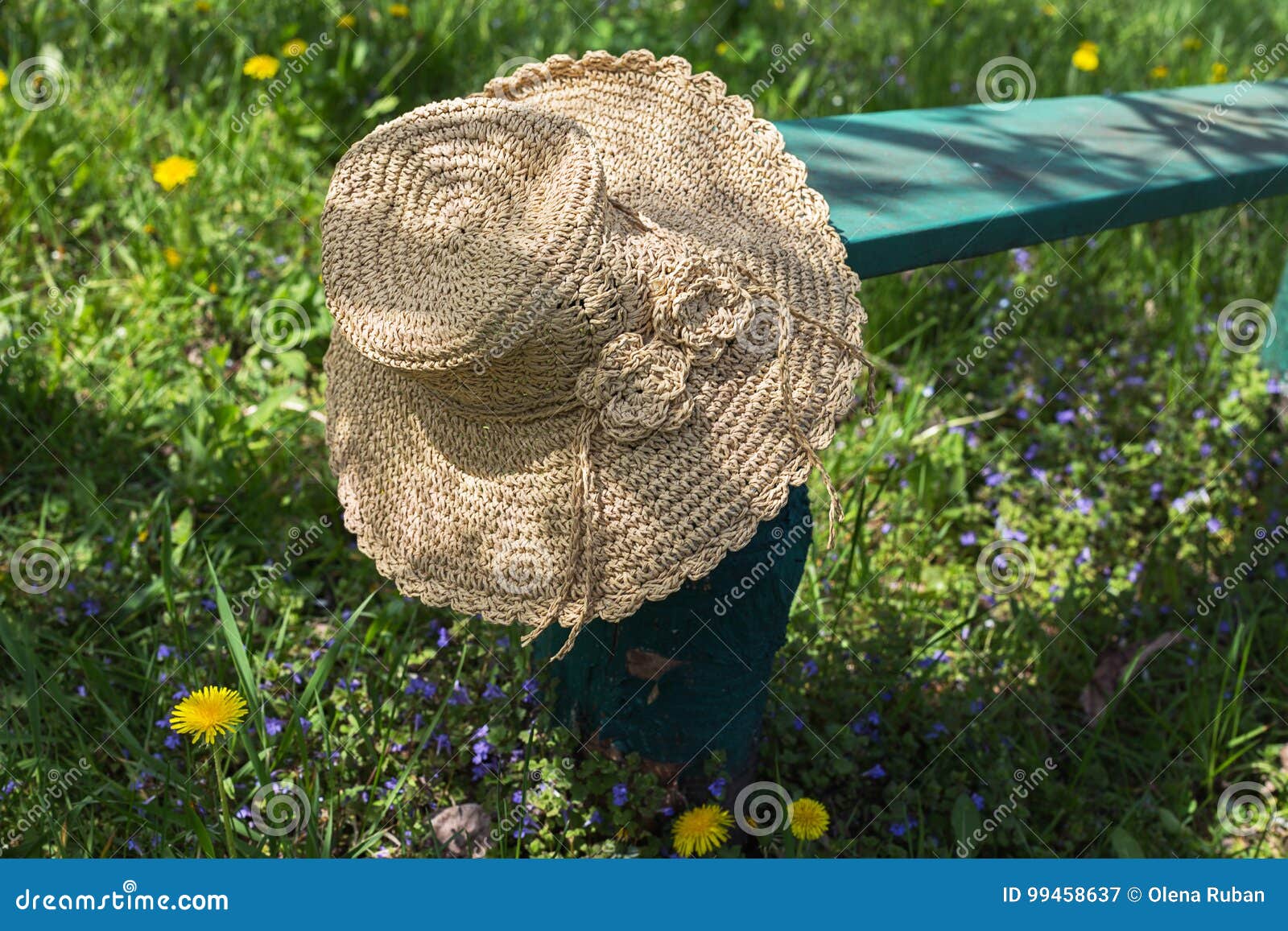 Straw hat on a bench. stock image. Image of basketry - 99458637