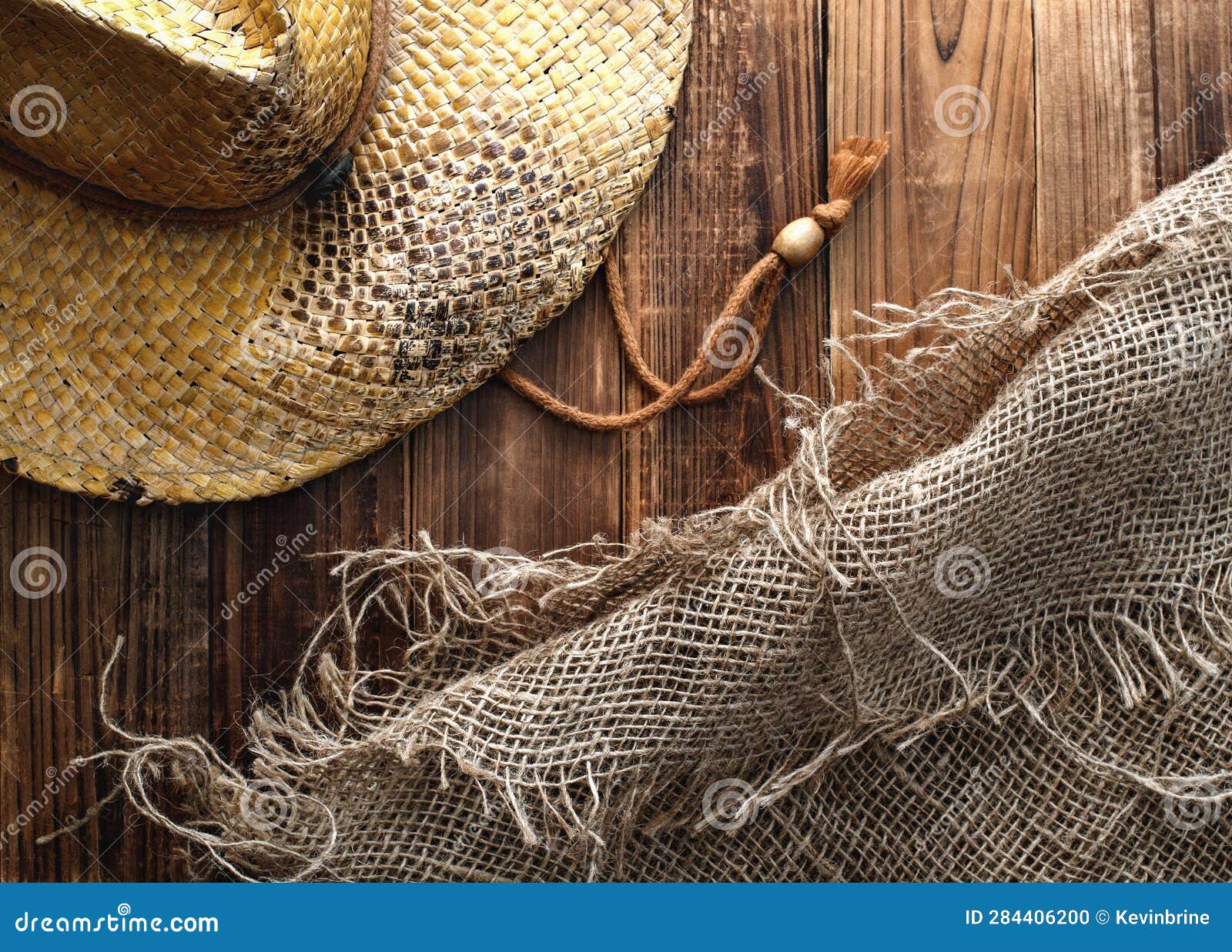 Straw Hat and Burlap stock photo. Image of burlap, wood - 284406200