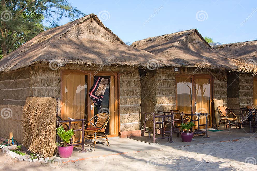 Straw house on a beach stock photo. Image of holiday - 25341886
