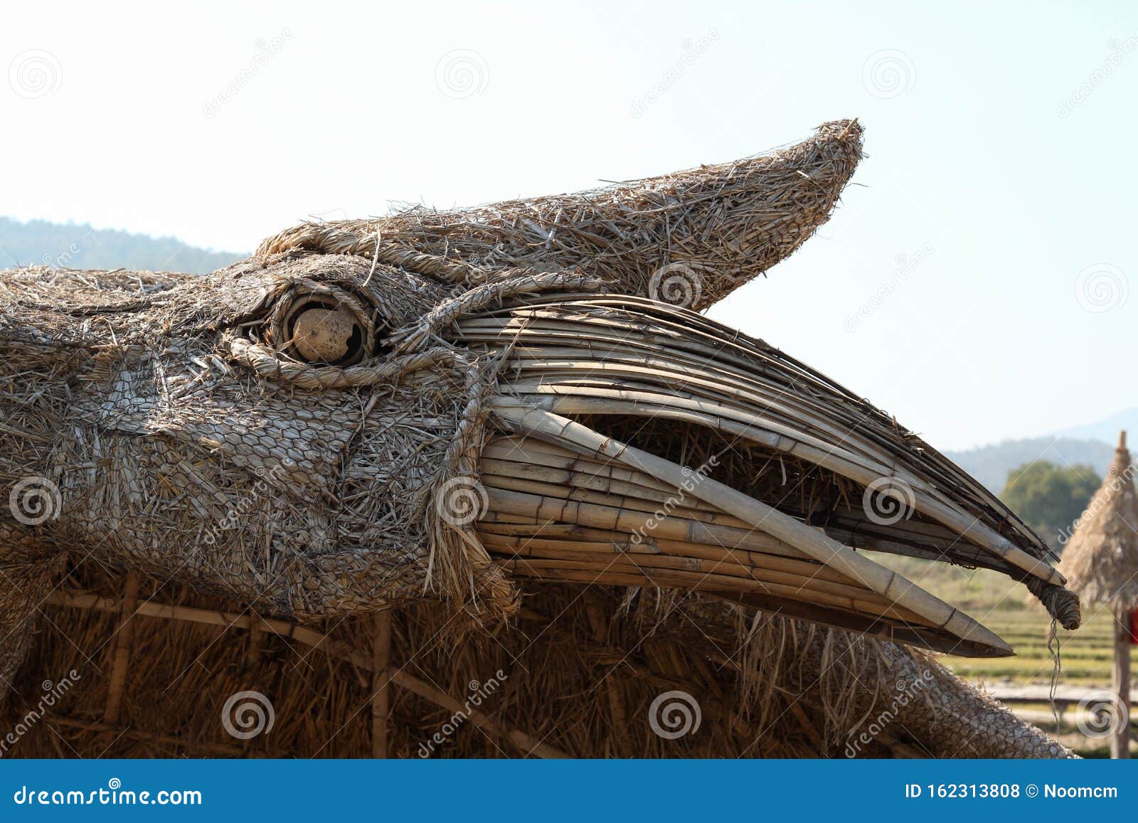 Straw puppet is the bird stock photo. Image of design - 162313808