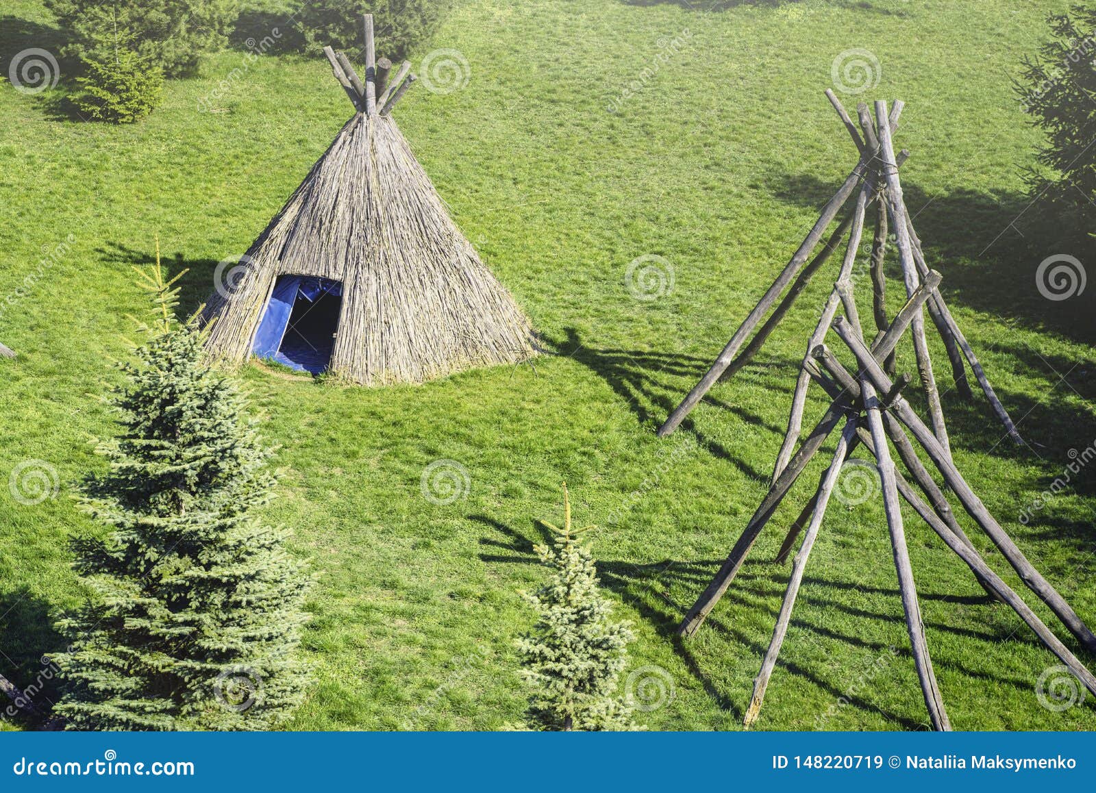Straw Wigwam on a Glade on a Sunny Spring Day. Wigwam Type Thatch Huts ...