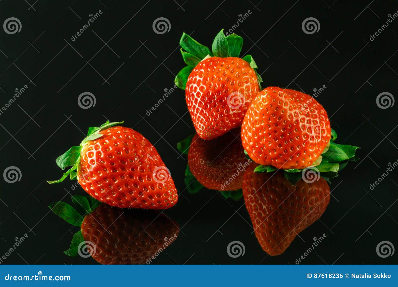 Strawberries on Black Background Stock Photo - Image of fruit, green ...
