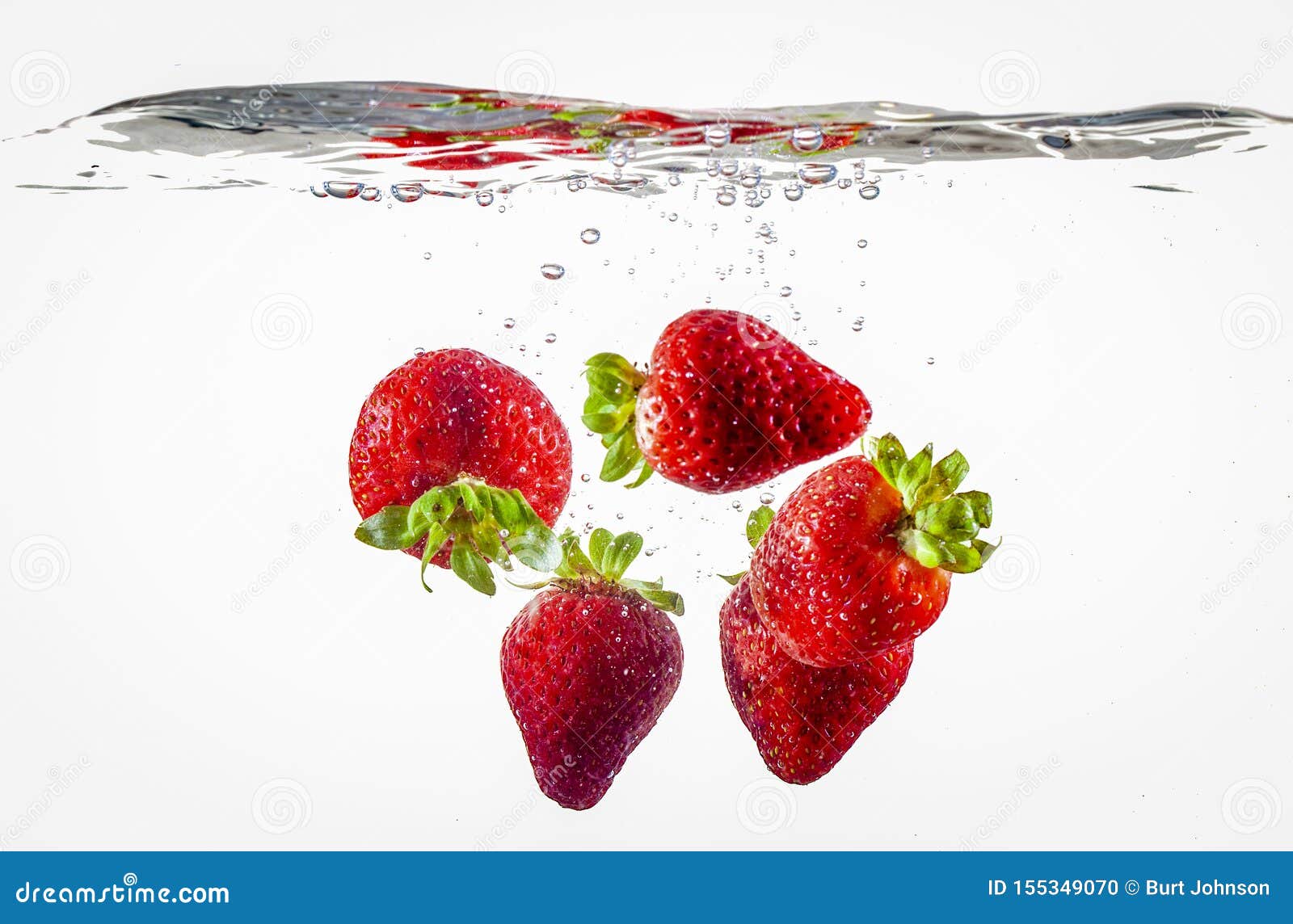 Strawberries Floating in Water Stock Photo - Image of liquid, health ...