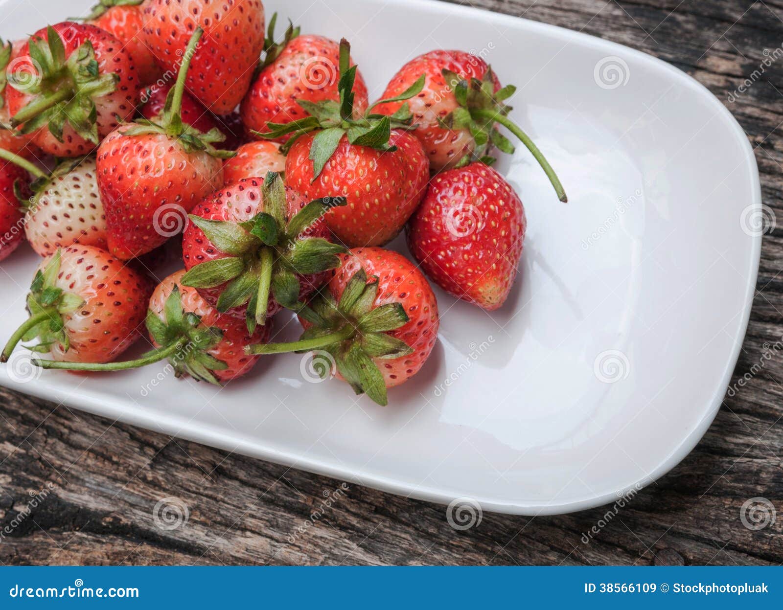 Strawberries on an Old Wooden Textured Table Top Stock Image - Image of ...