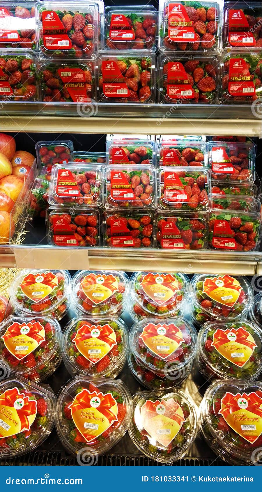 Strawberries in Plastic Boxes at the Grocery Store Counter Editorial ...
