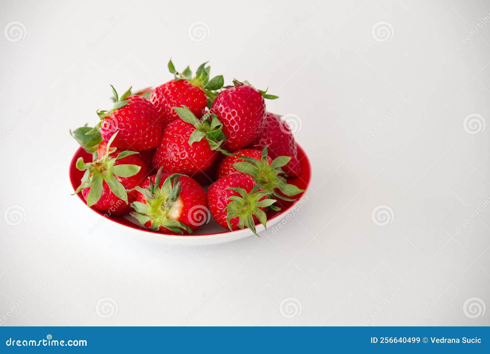 Strawberries on a plate stock image. Image of delicious - 256640499