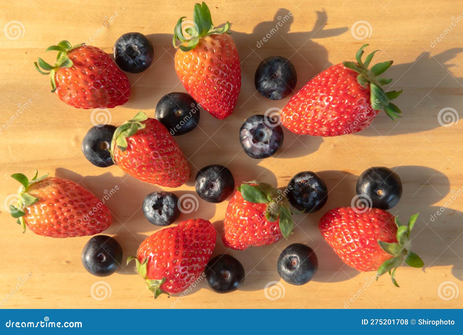 Strawberries and Raspberry on the Table Stock Photo - Image of ...