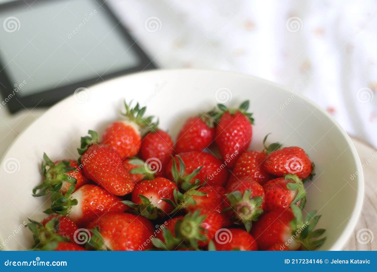 Strawberries and Tablet stock photo. Image of healthy - 217234146