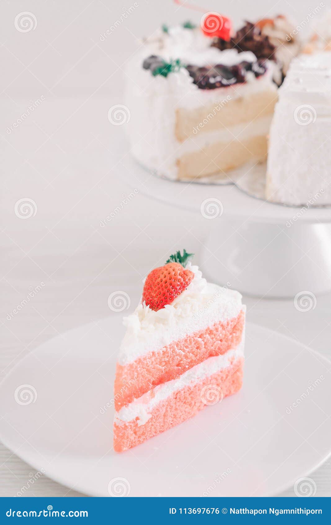 Strawberry cake on plate stock photo. Image of pink - 113697676