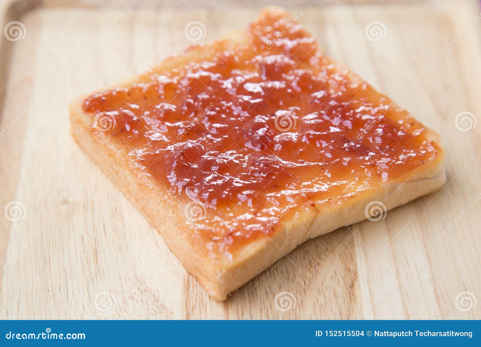 Strawberry Jam Spread on Bread on Wooden Plate Stock Photo - Image of ...