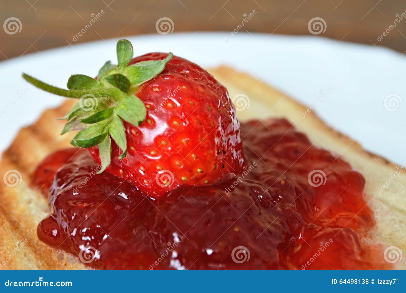 Strawberry jam on toast stock photo. Image of spread - 64498138