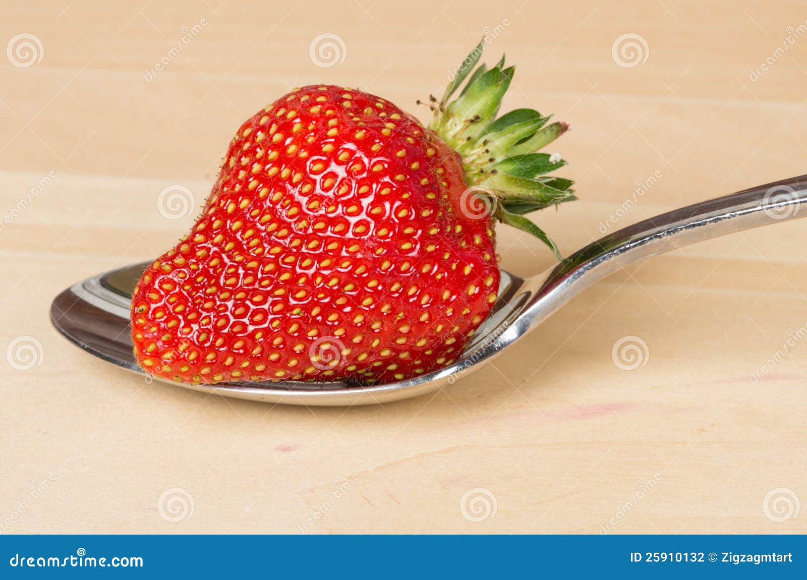 Strawberry on metal spoon stock photo. Image of strawberries - 25910132