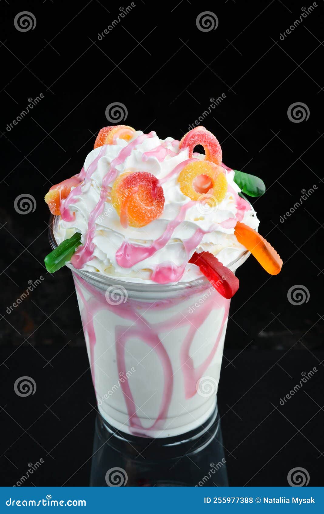 Strawberry Milkshake in a Plastic Cup. on a Black Background Stock ...