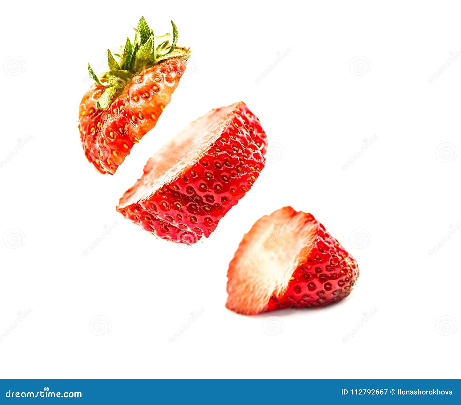 Strawberry in Pieces in the Air. Sliced Strawberry Floating on Air ...