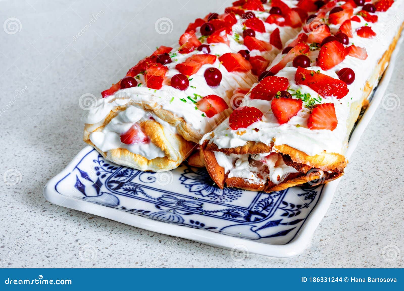 2 Strawberry Roulade Cakes on Decorative Plate Stock Photo - Image of ...