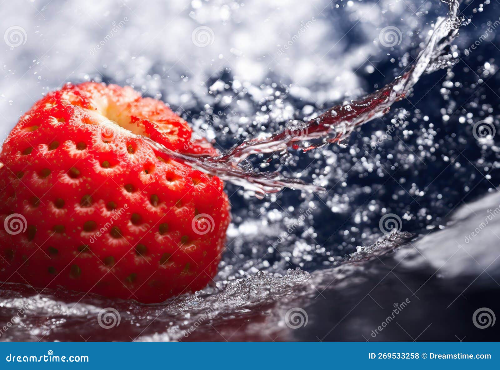 Strawberry Splashed with Water with a Stream of Water Stock Photo ...
