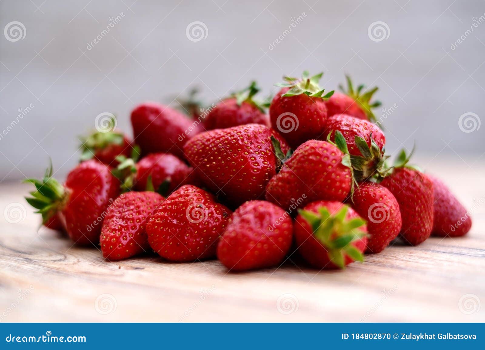 Strawberry on Top of a Wooden Table Stock Photo - Image of juice, board ...