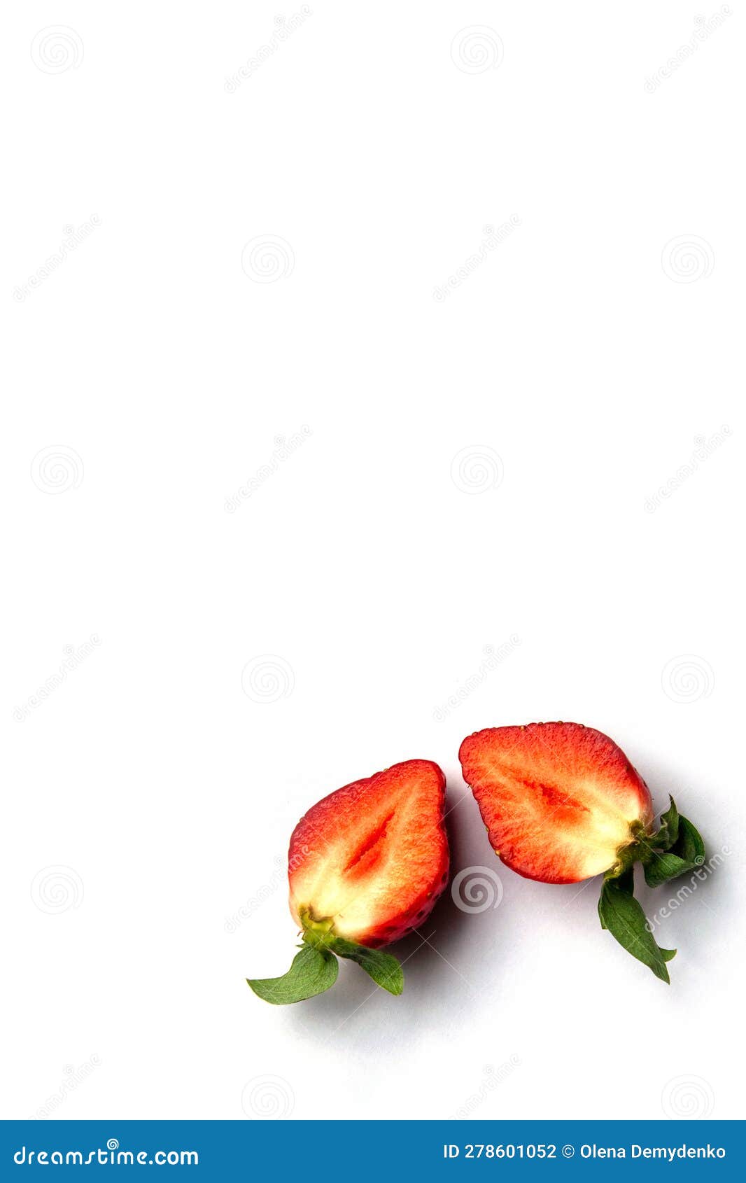 Two Halves of Strawberry Berries on a White Background with Copy Space ...
