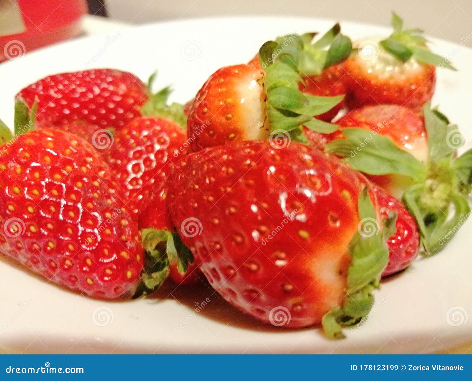 Strawberry on white plate stock image. Image of fruit - 178123199