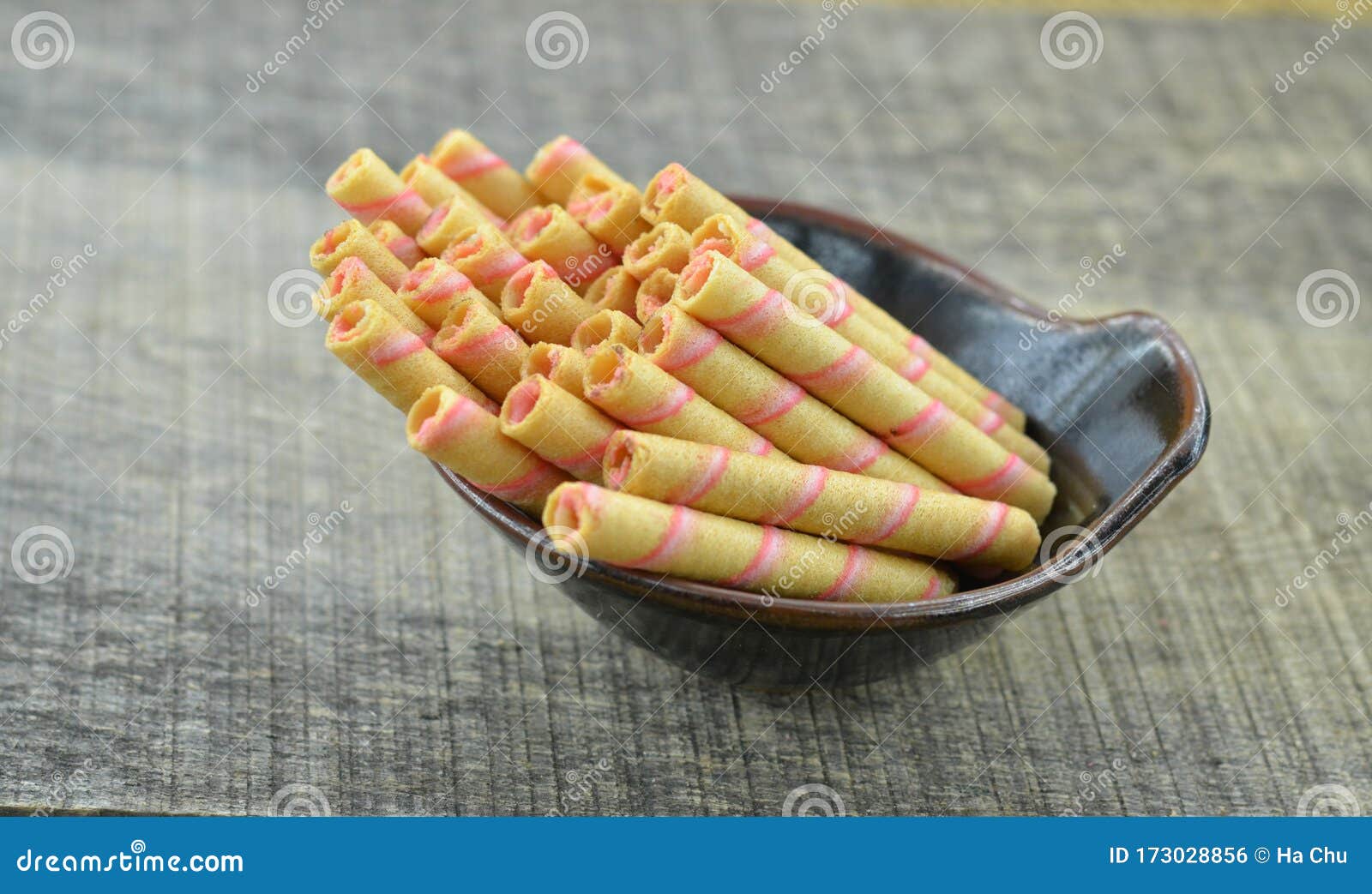Strawberry Yogurt Waffle Roll Stick in Black Bowl Stock Photo - Image ...