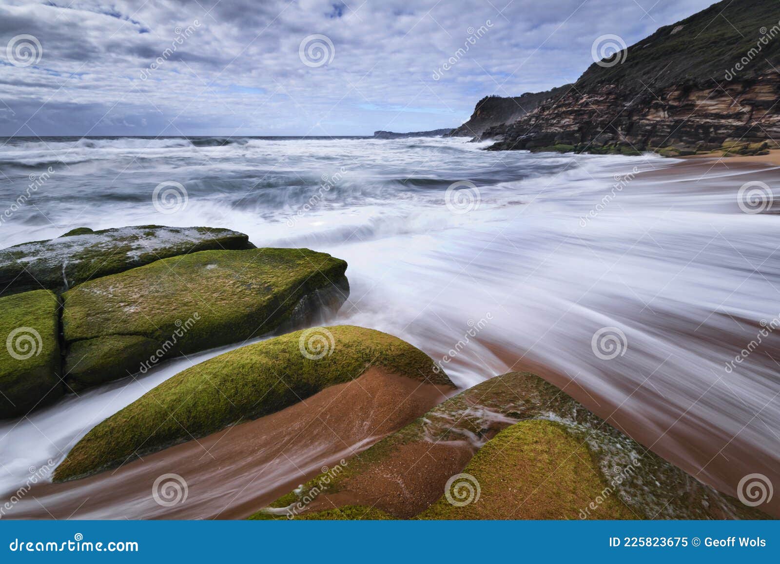 Streak of Water Flowing from the Beach To the Ocean Stock Image - Image ...