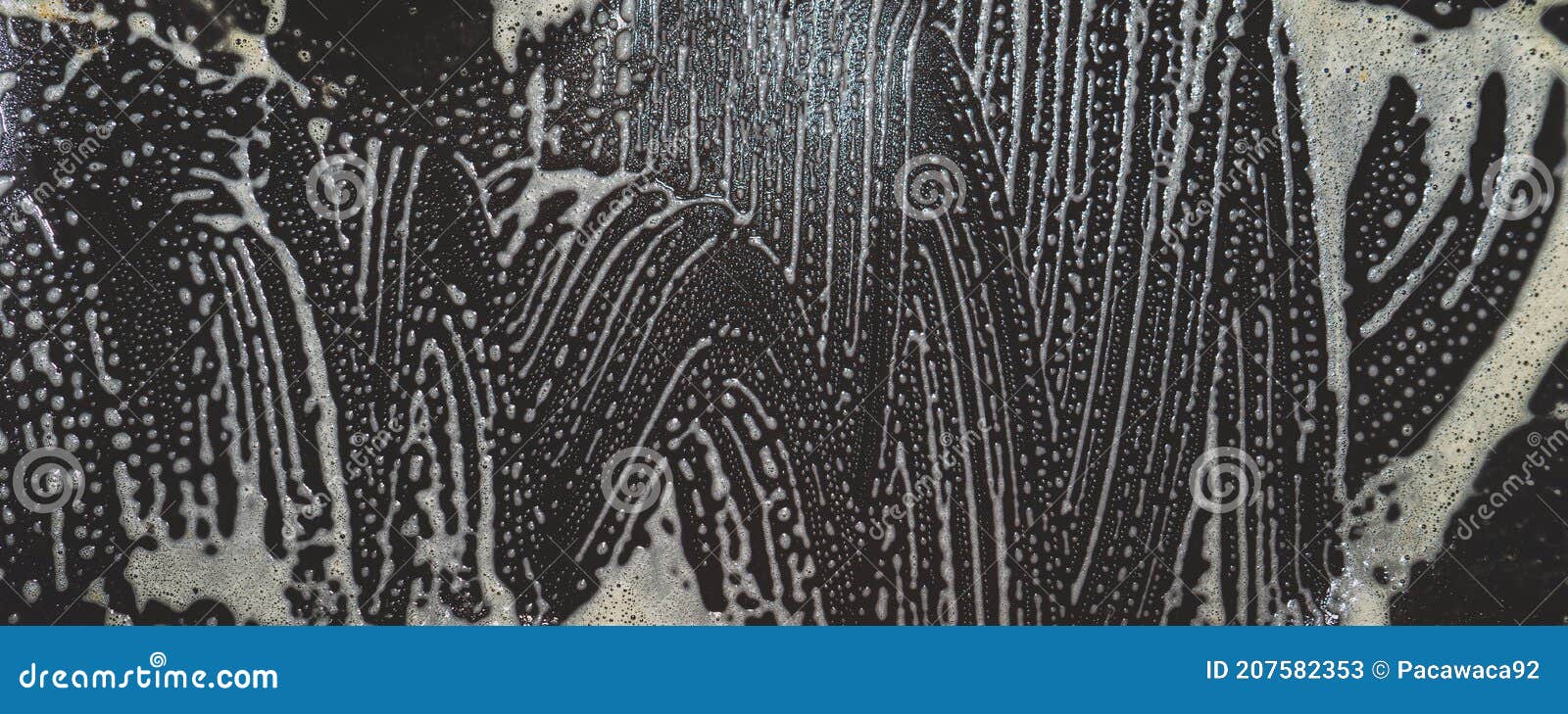 Streaks of Detergent Foam on a Dark Glossy Surface Stock Image - Image ...
