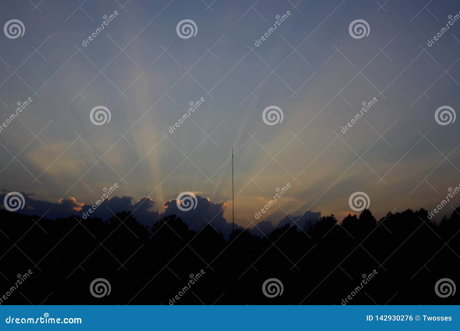 Streaks of Light from a Setting Sun Stock Photo - Image of sunrise ...