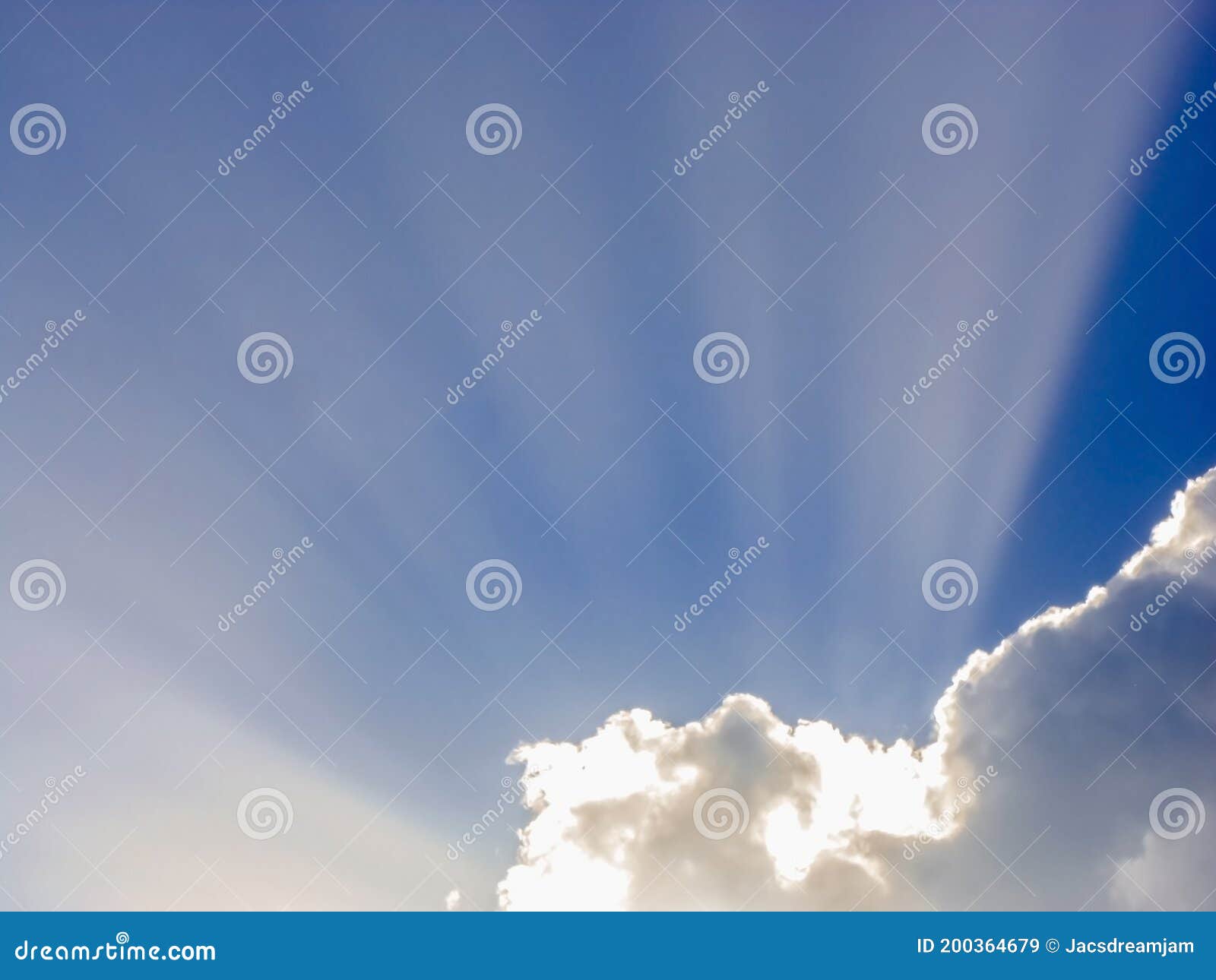 Sun Radiates Through A Cloud And Creates Ocean Spotlight Stock ...