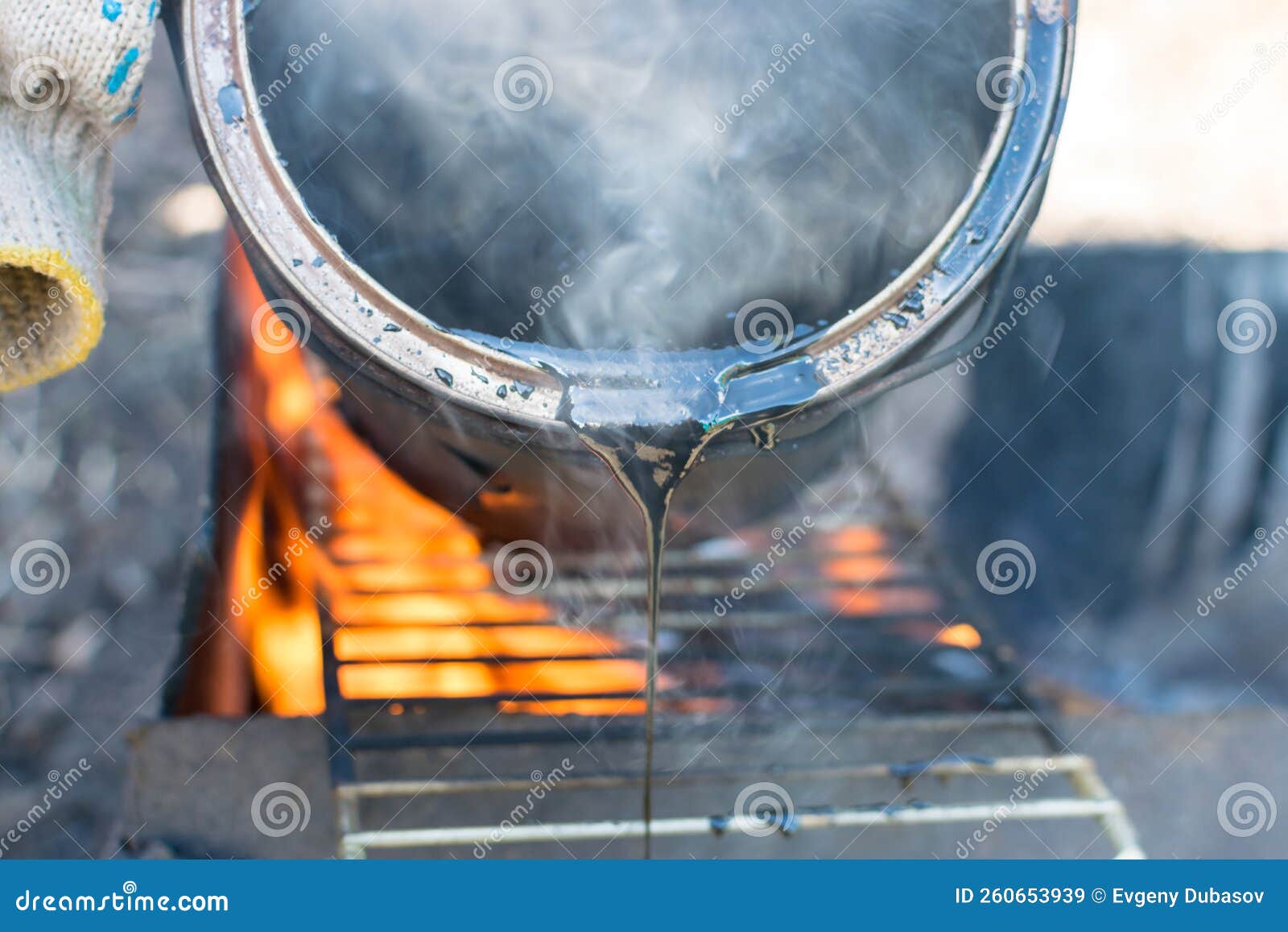 Stream of Black Tar with Steam on Fire for Processing Stock Image ...